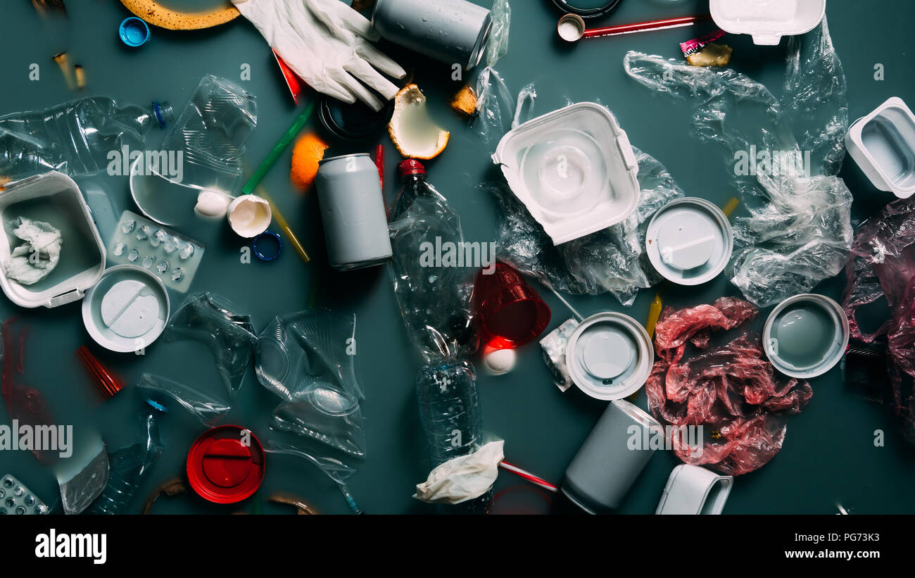 top view of garbage flowing in water, ecology protection and recycle ...