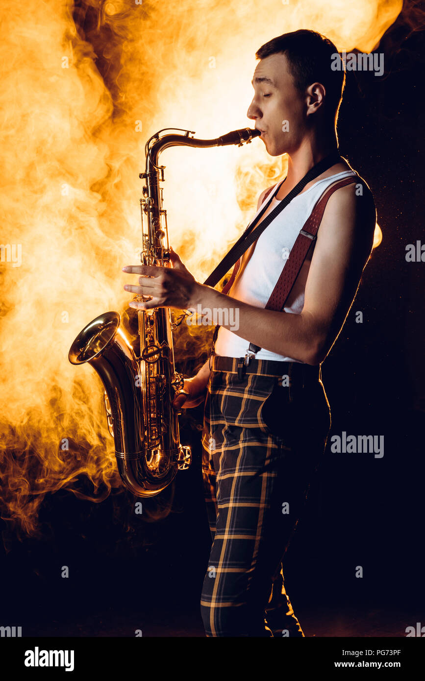 Saxophonist backlit hi-res stock photography and images - Alamy