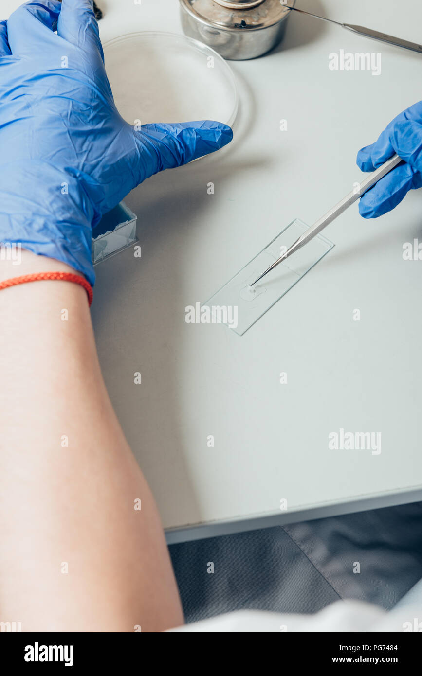 partial view of scientist during work in modern laboratory Stock Photo ...