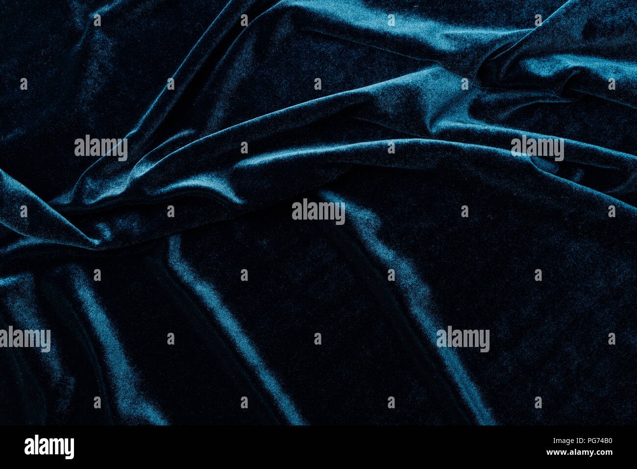 Turquoise folded fabric hi-res stock photography and images - Alamy