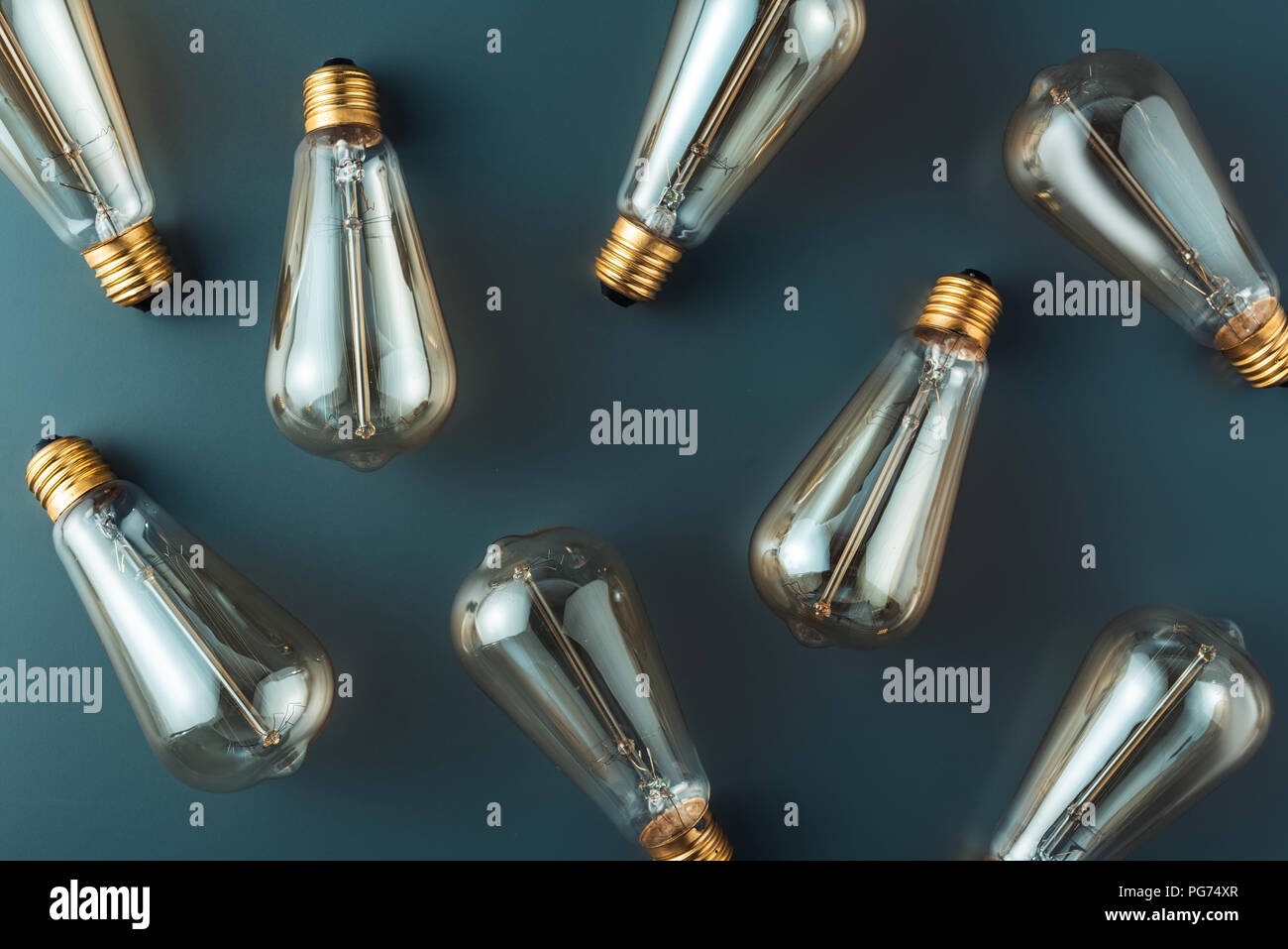 top view of light bulbs on grey background, energy concept Stock Photo ...