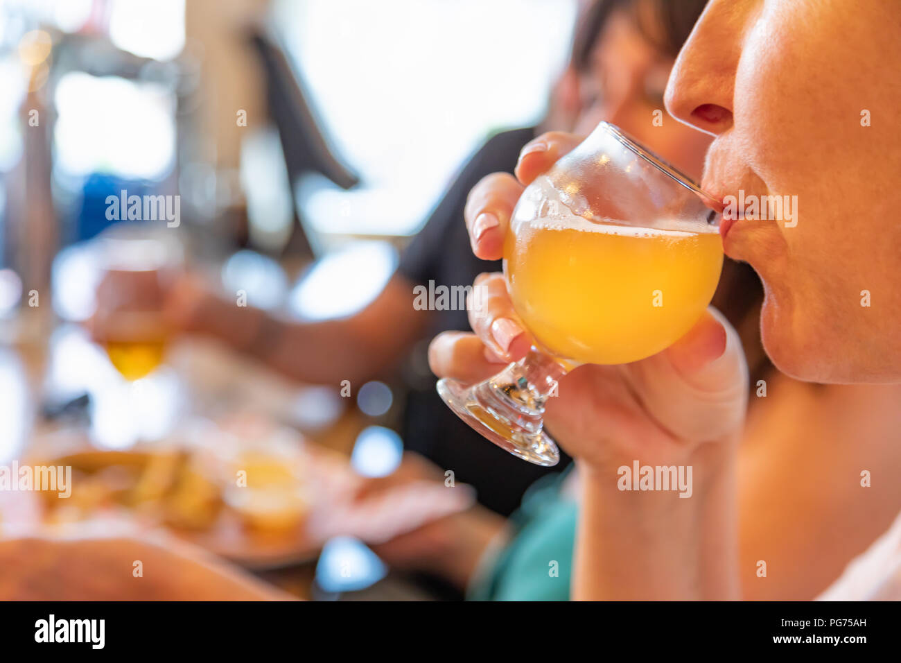 Sipping alcohol hi-res stock photography and images - Alamy