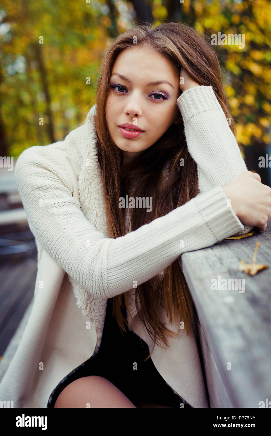 Brown hair model posing outdoor, autumn Stock Photo - Alamy