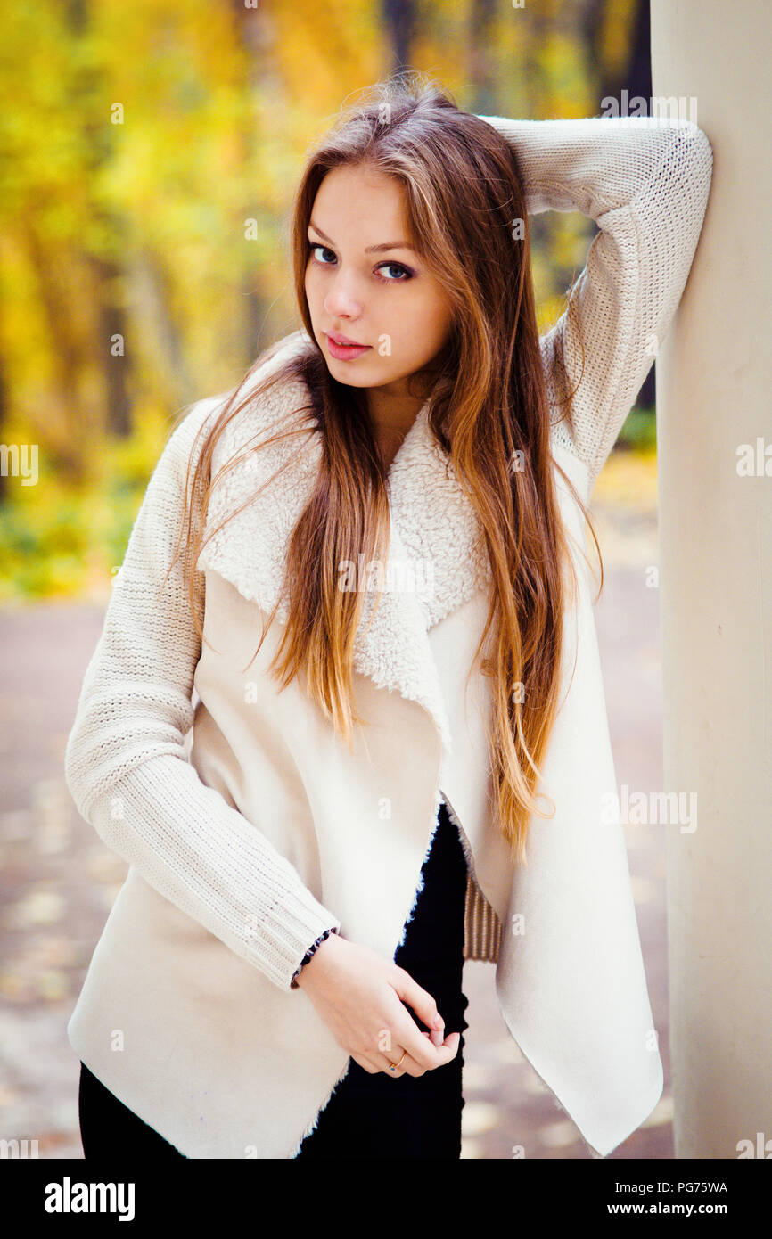 Brown hair model posing outdoor, autumn Stock Photo - Alamy