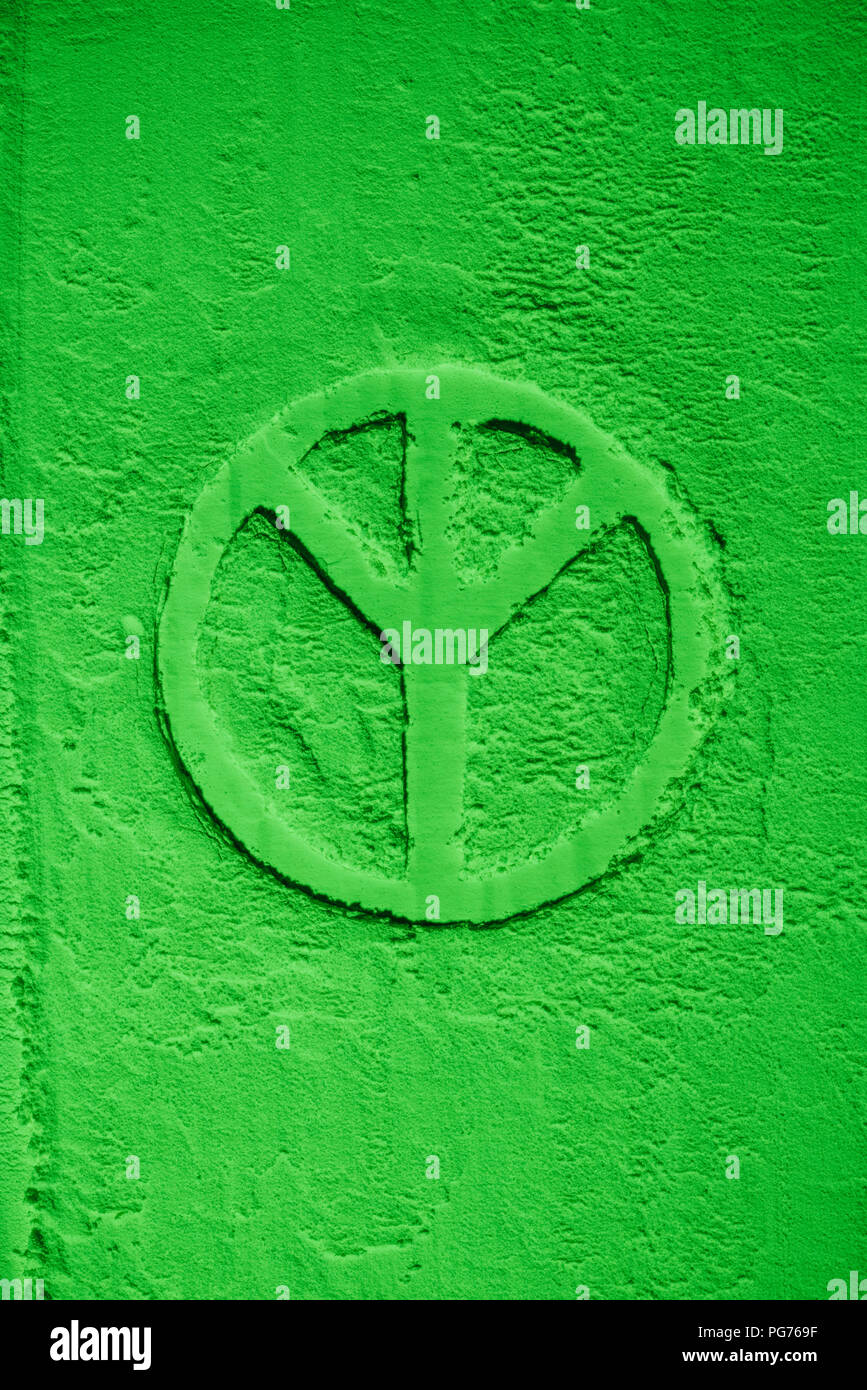 top view of greenpeace symbol in green flour Stock Photo - Alamy