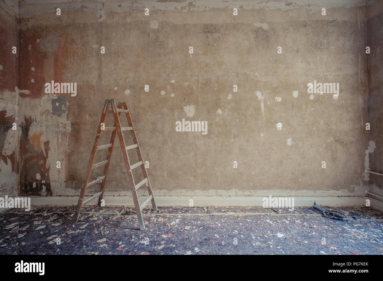 ladder in empty room during renovation - home decoration, restoration ...
