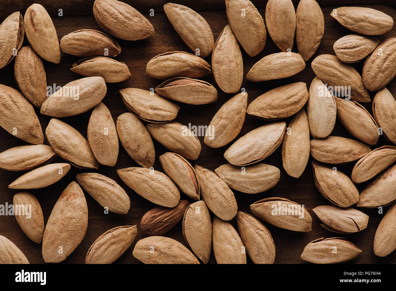 Top view of tasty almonds in full screen Stock Photo - Alamy