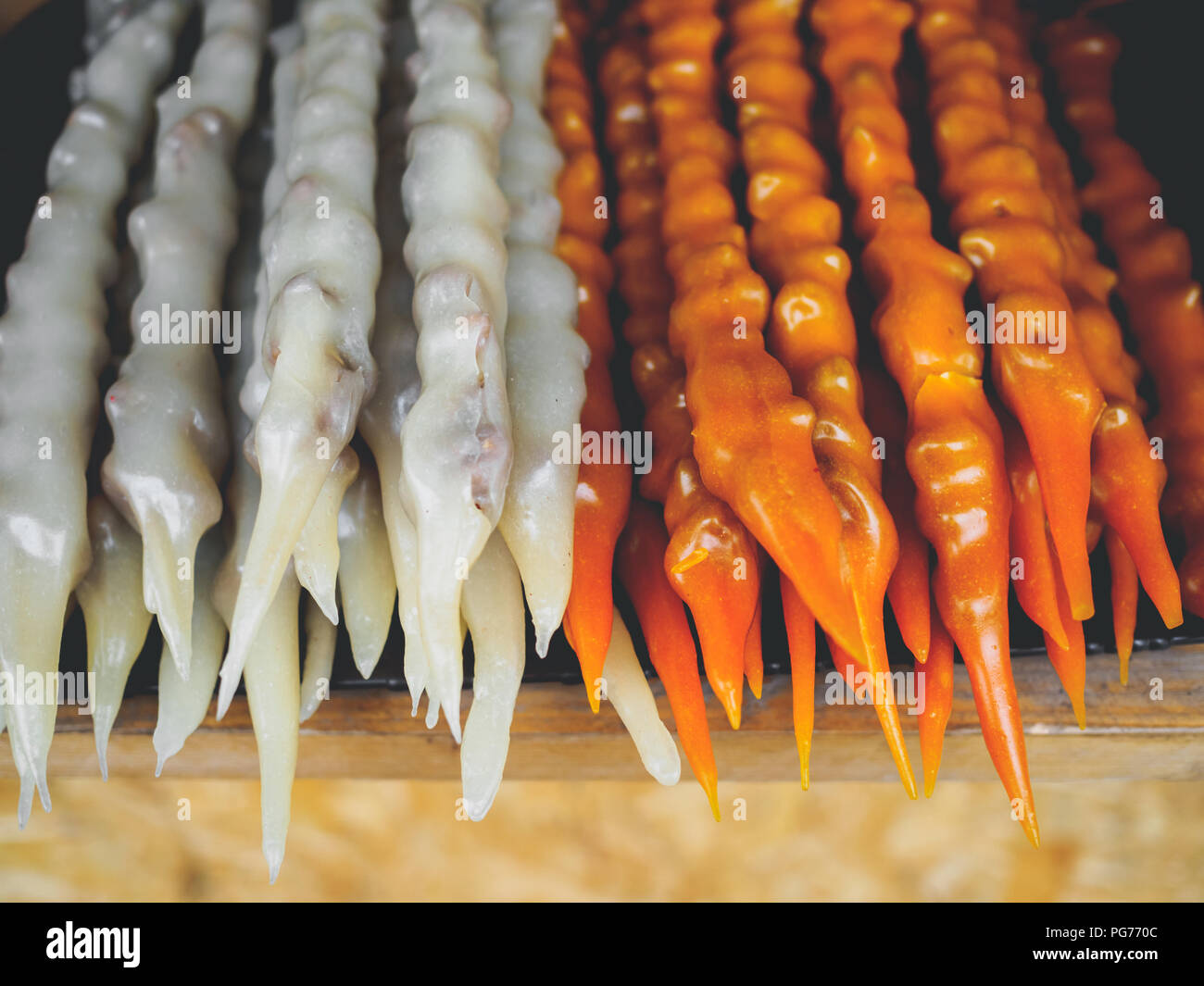 close up of tasty churchkhela with syrup at georgian market Stock Photo ...