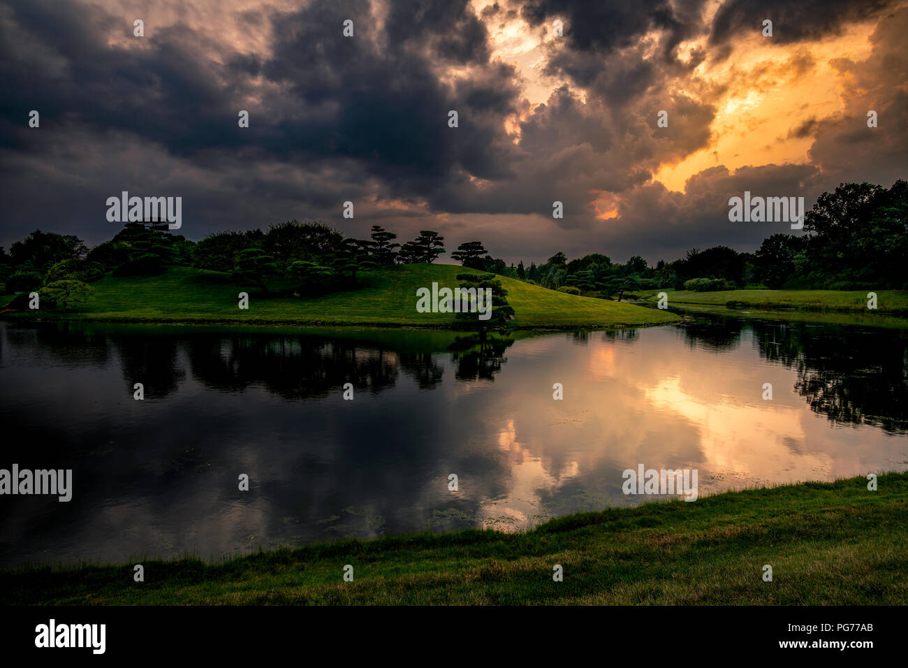 Sunset reflection at the lake Stock Photo - Alamy