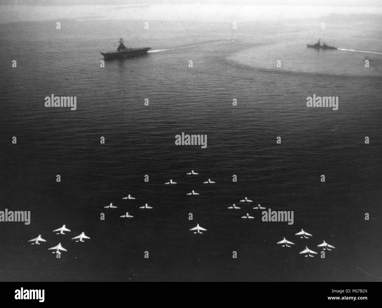 Attack Carrier Air Wing 8 aircraft approach USS Shangri-La (CVA-38) in ...