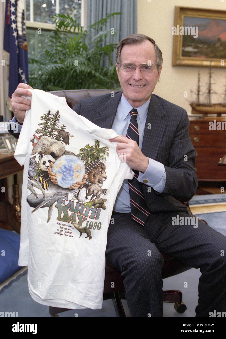 President Bush Shows his T-Shirt Honoring Earth Day 1990 4 4 1990 Stock ... President Bush Shows his T-Shirt Honoring Earth Day 1990 4 4 1990 Stock ...