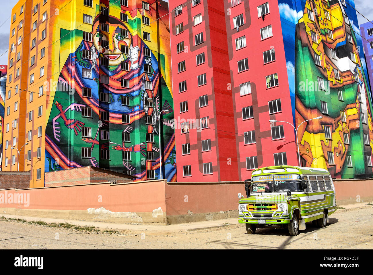 Brightly colored murals painted by Bolivian artist Roberto Mamani ...
