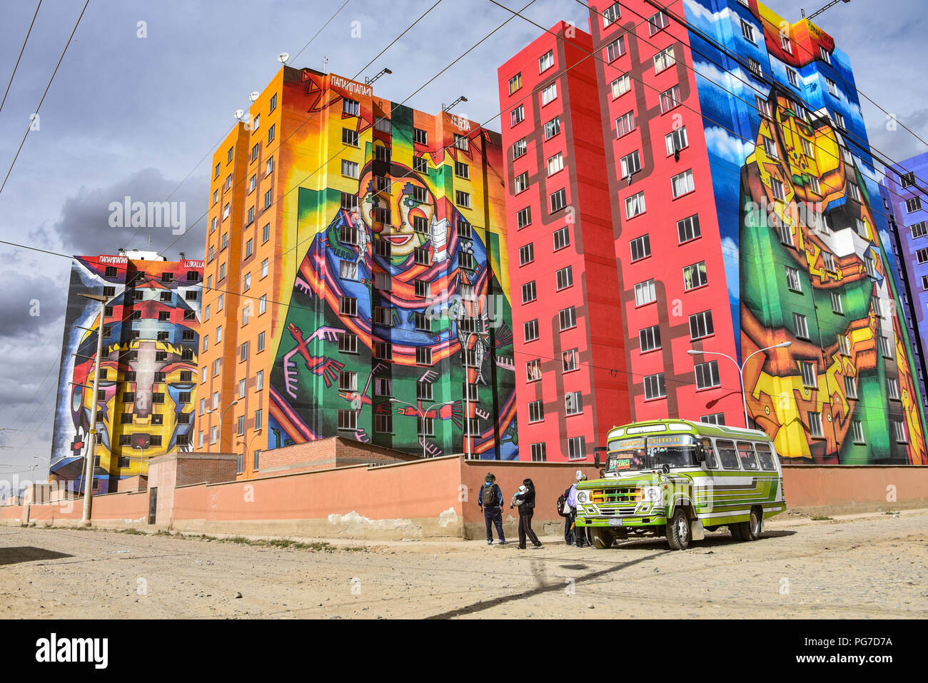 Brightly colored murals painted by Bolivian artist Roberto Mamani ...