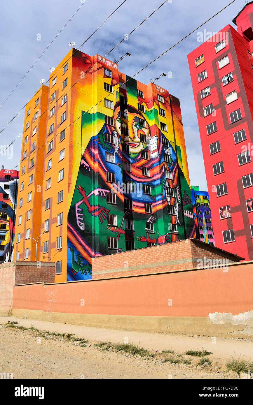 Brightly colored murals painted by Bolivian artist Roberto Mamani ...