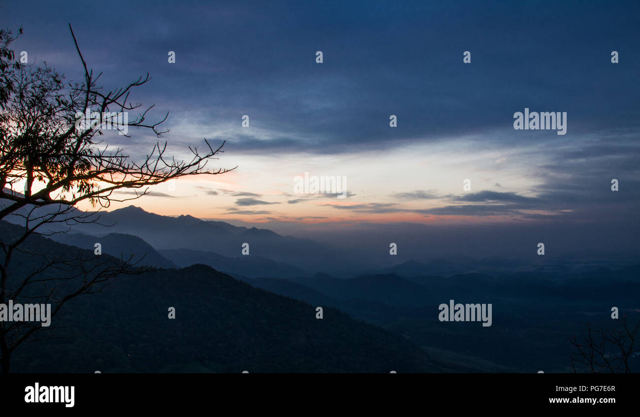 Sunset in Munnar, Kerala, India Stock Photo - Alamy