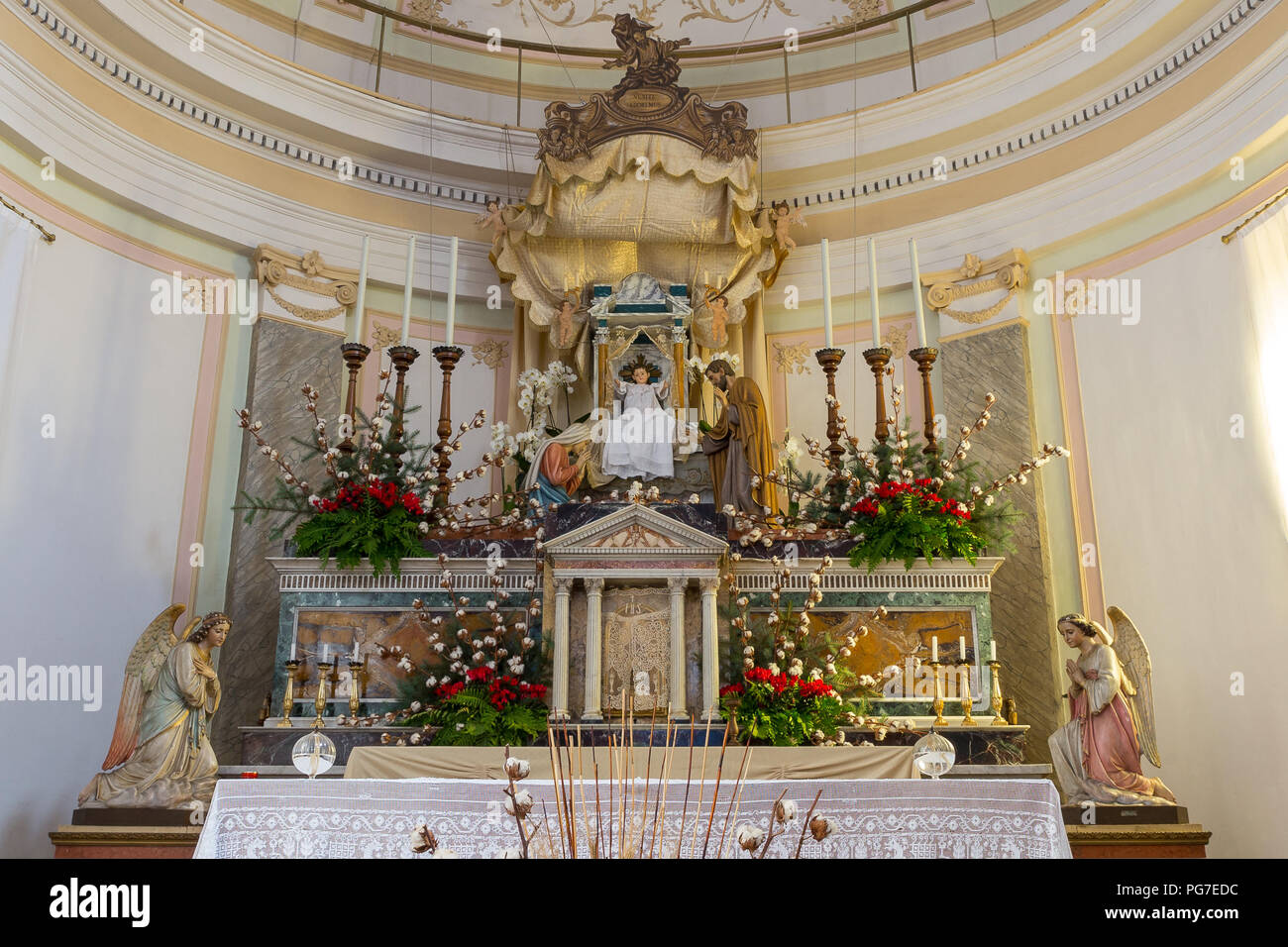 Christianity. Altar of the Christian nativity with red and white ...