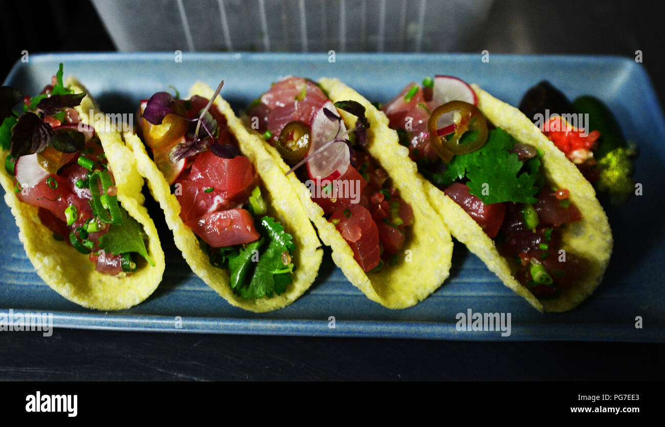 Tuna Sashimi taco with finger lime garish Stock Photo - Alamy