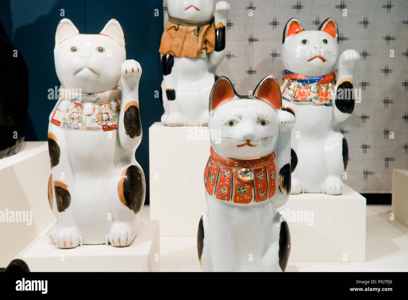 Mikawa style Maneki neko (Japanese ceramic "beckoning cat Stock Photo ...