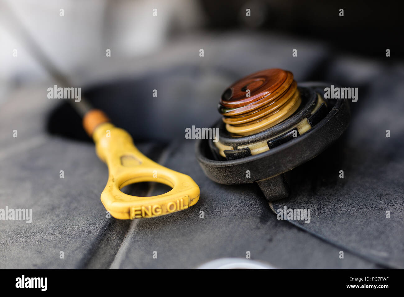 Oil filler for the car engine. Replenishing liquids in the drive unit ...