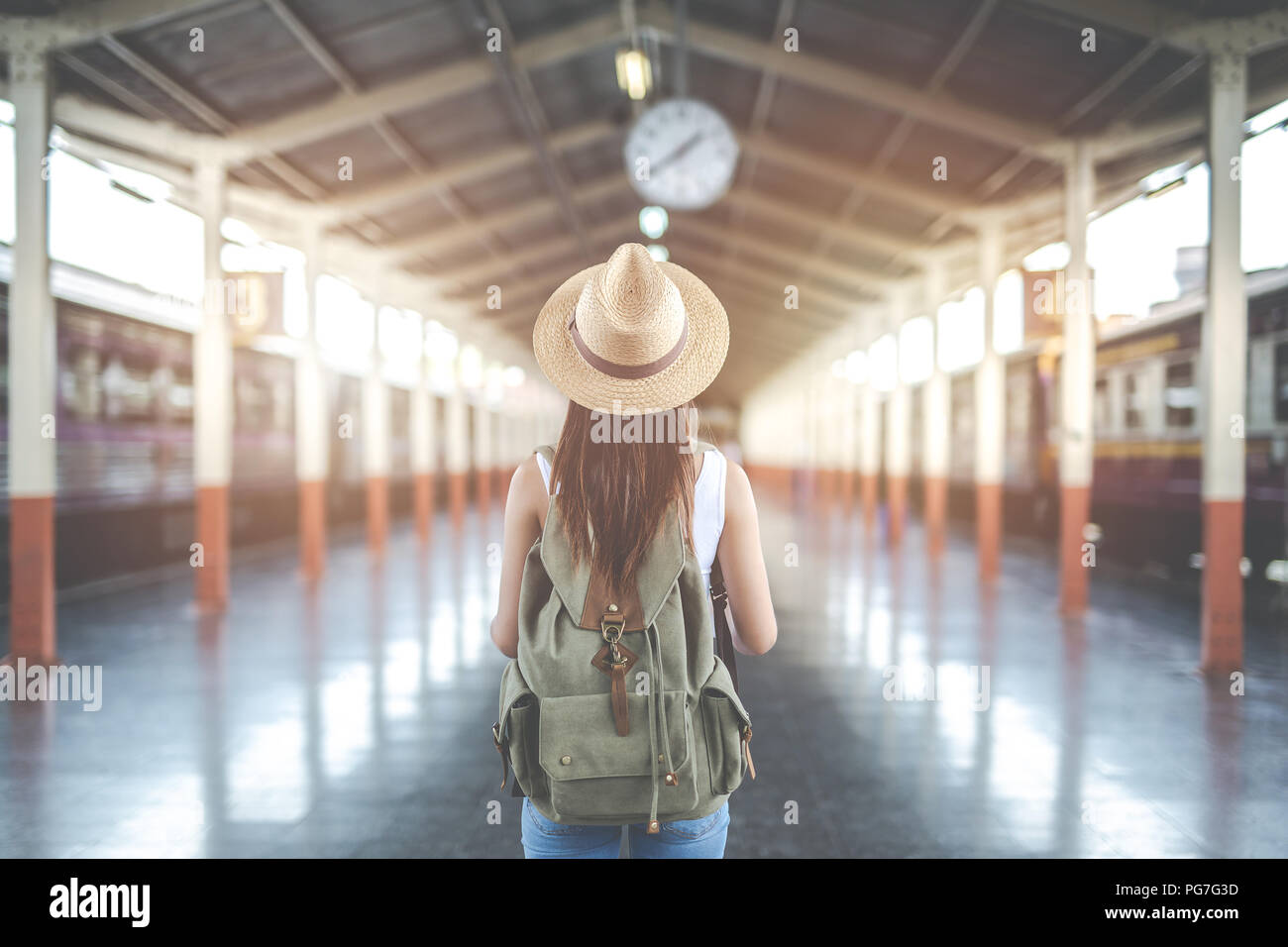 Backpack girl rail station hi-res stock photography and images - Alamy