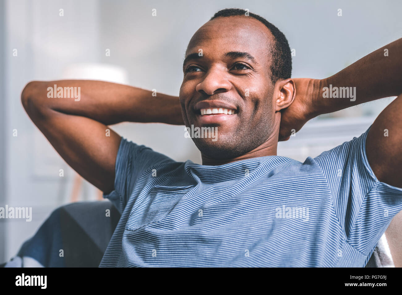 Attractive man looking aside Stock Photo - Alamy