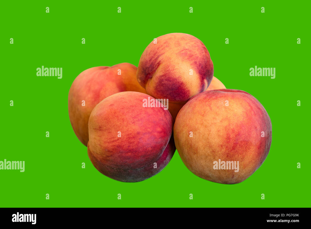 beautiful, large, red peaches with yellow spots on a green background ...