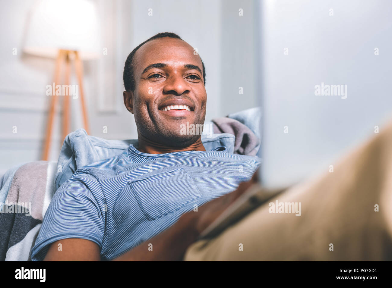Cheerful positive man dreaming hi-res stock photography and images - Alamy