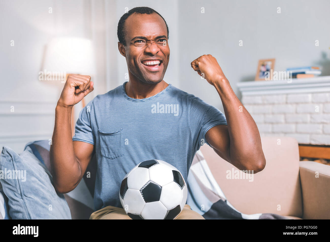 Proud man celebrating the victory Stock Photo - Alamy