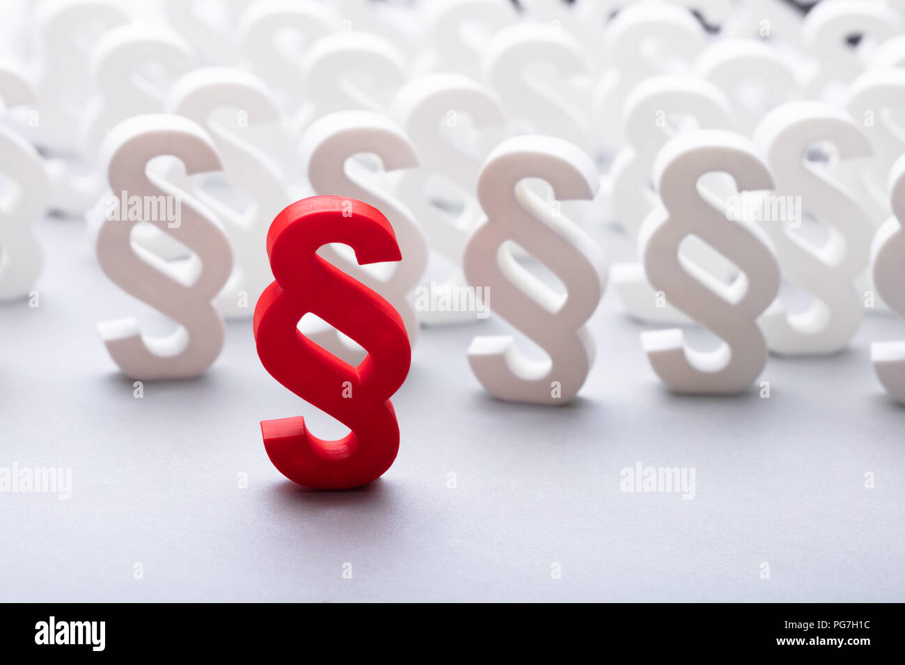 Red Paragraph Symbol Leading Others On Grey Background Stock Photo - Alamy