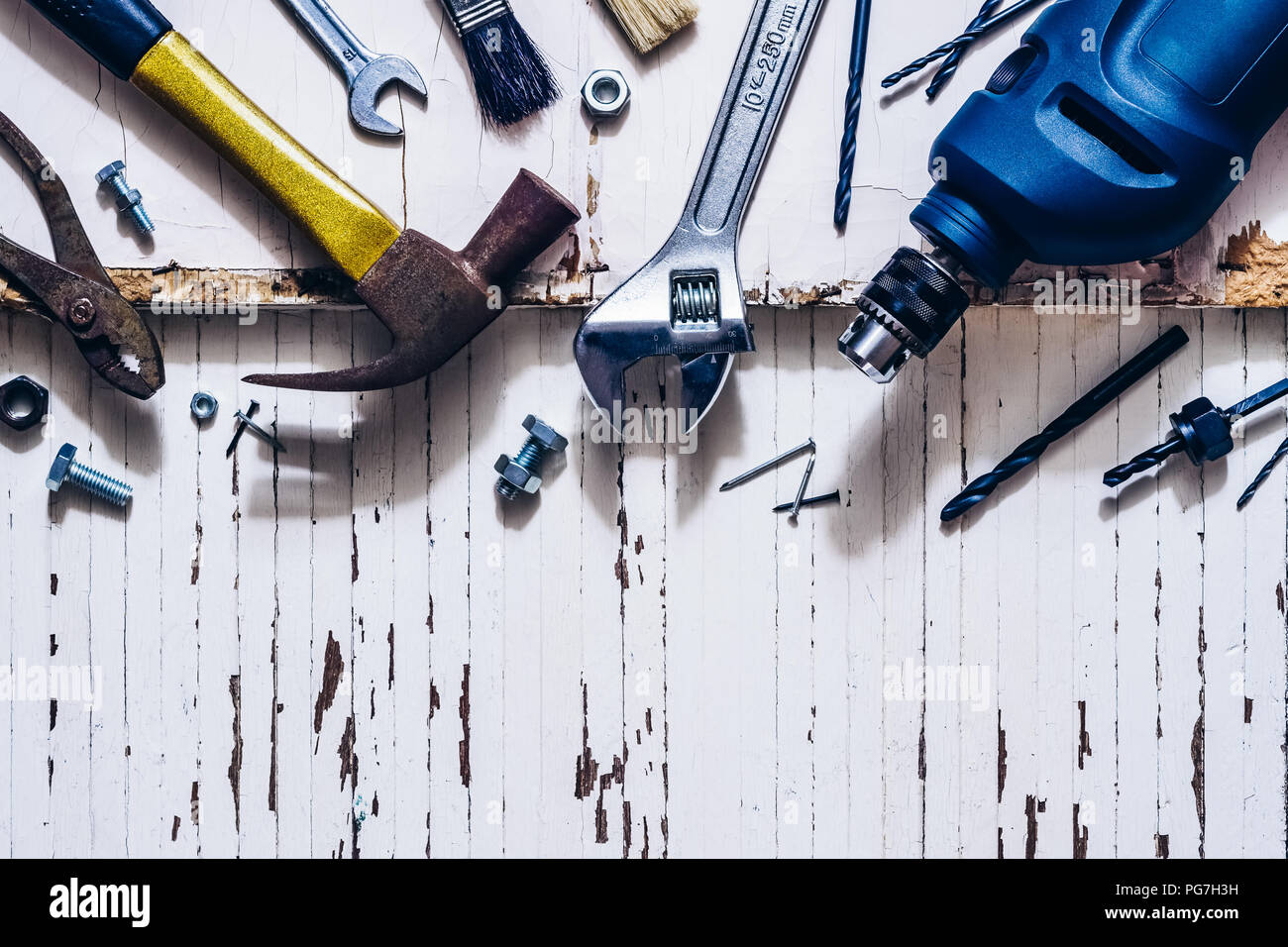 Top view close up of variety handy tools and rusty tools on grunge wood ...