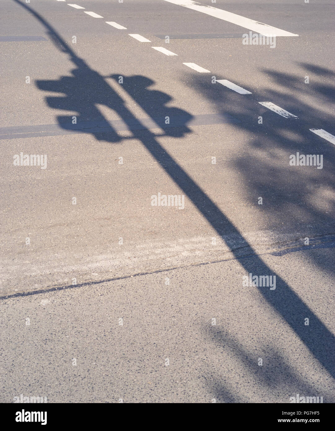 Abstract traffic lights shadow on the asphalt Stock Photo - Alamy