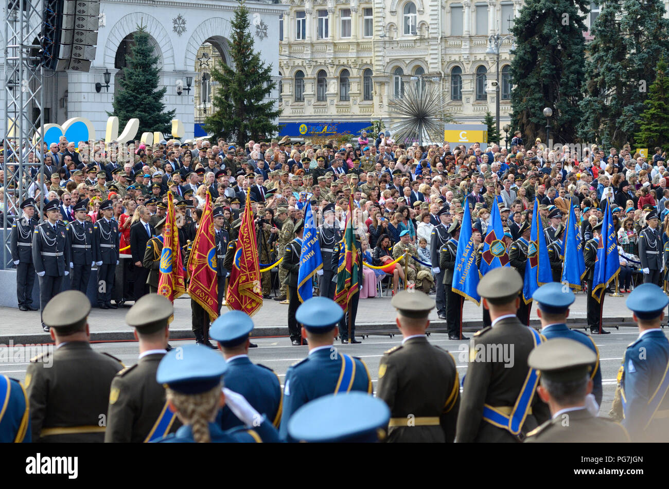 Honor guards standing in a line during military parade, spectators ...