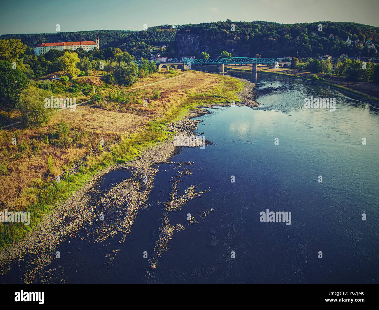 Empty river. Drying out of big river. Horrible smell of poisoned muddy ...