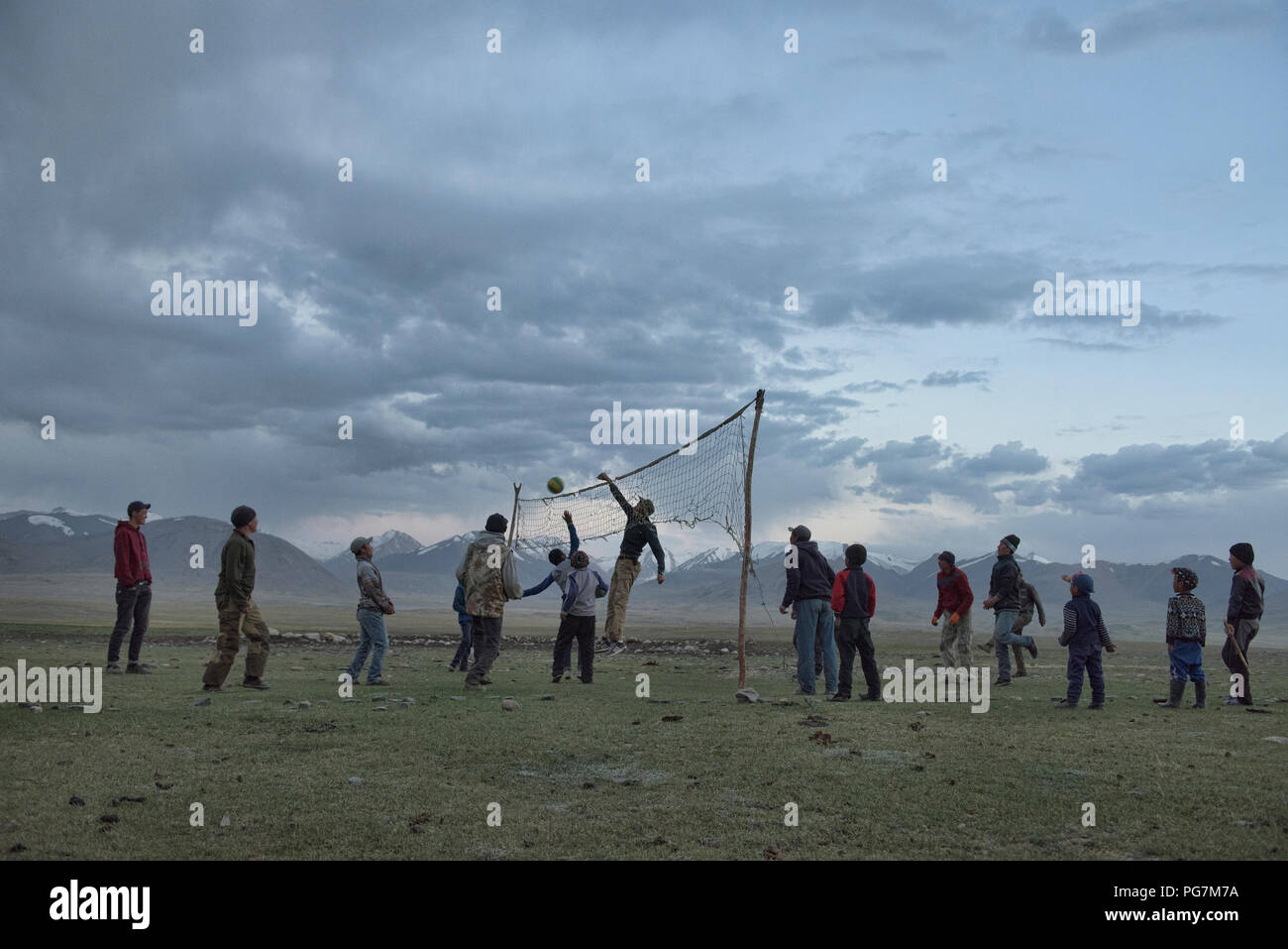 Volleyball game in front of the Great Pamir Range, Kara Jilga ...