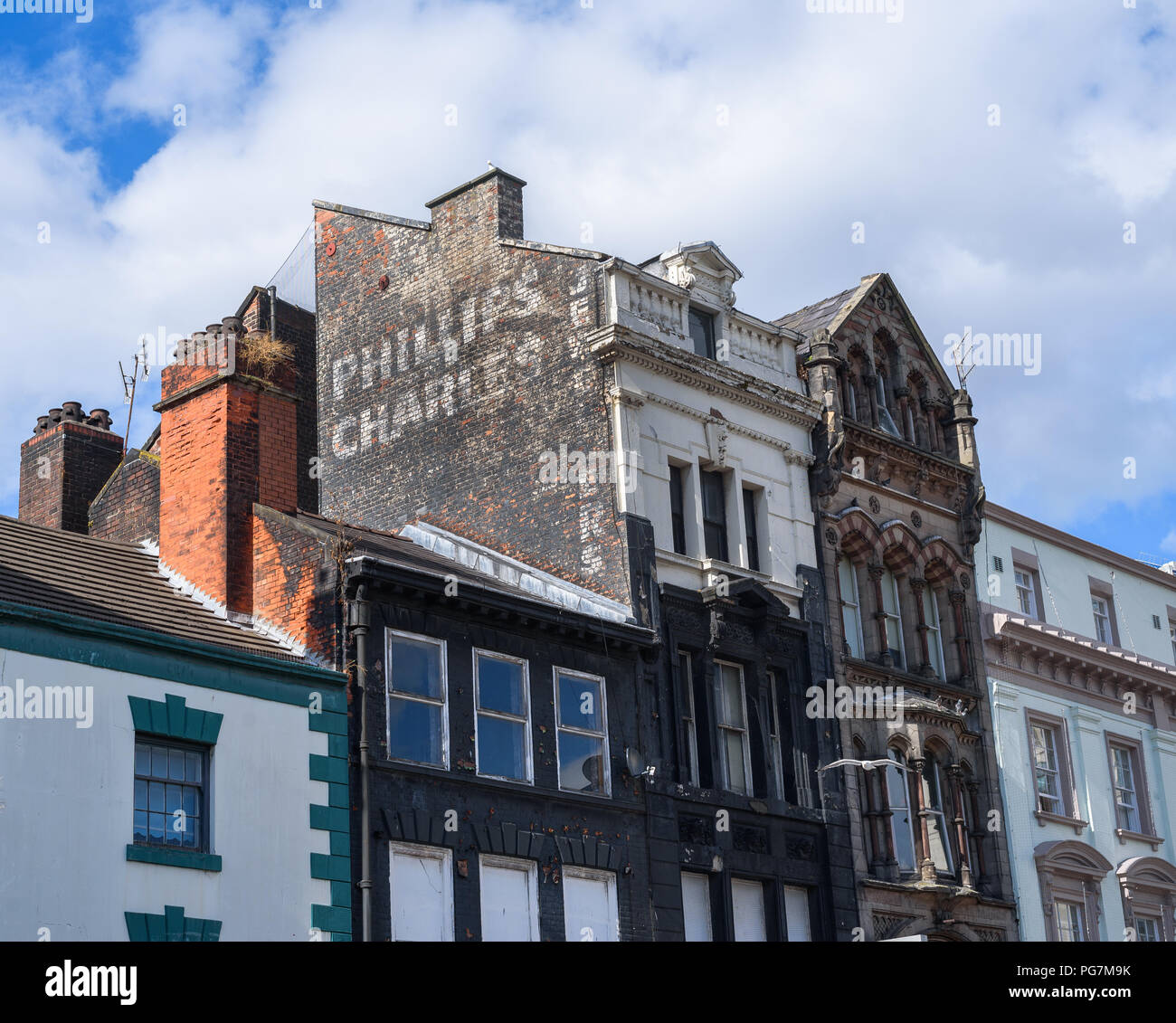 A faded old sign for "Phillips Charles Jewellers" on Rallagh Street ...