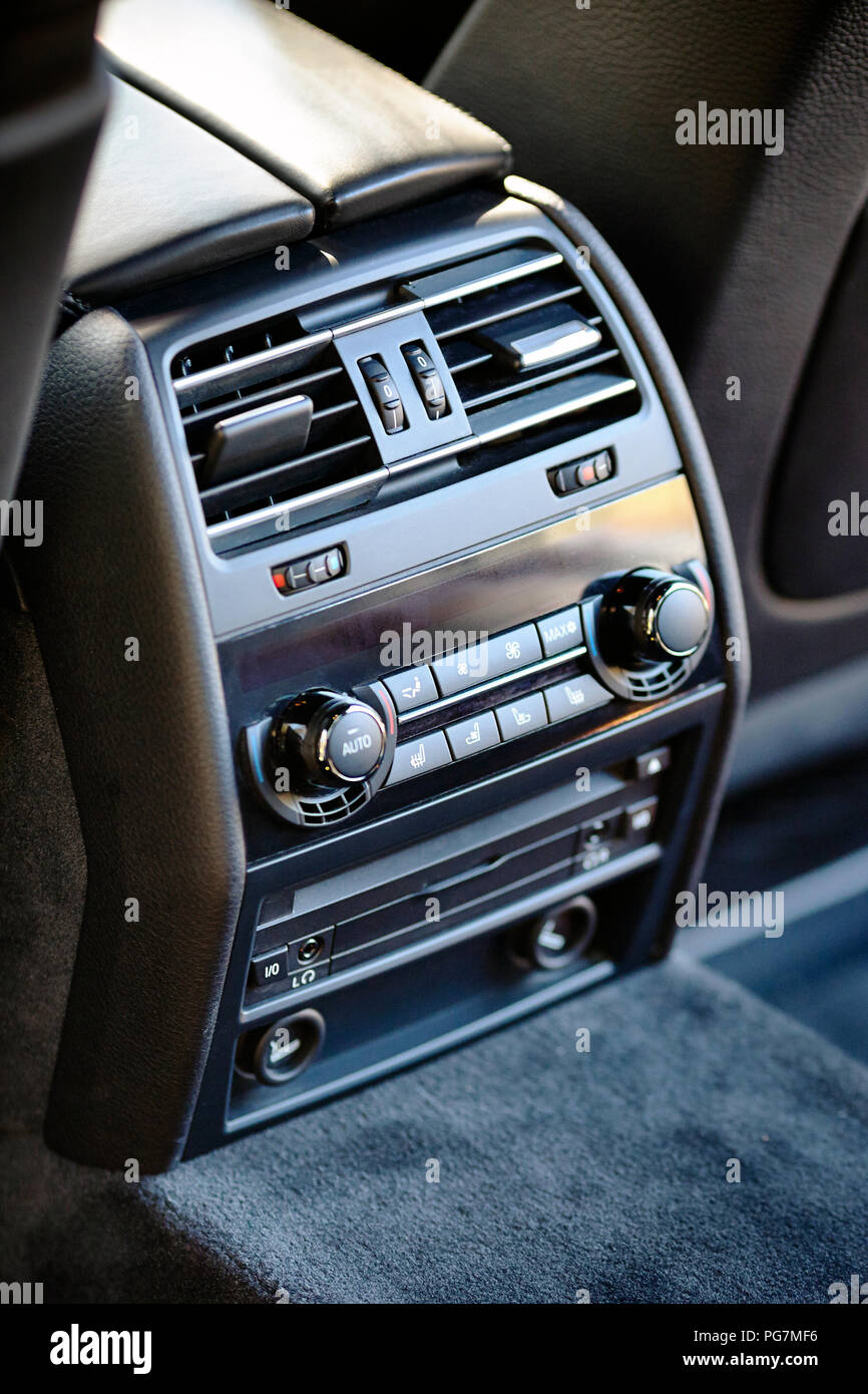 Modern luxury car climate control panel for passengers in the rear row ...