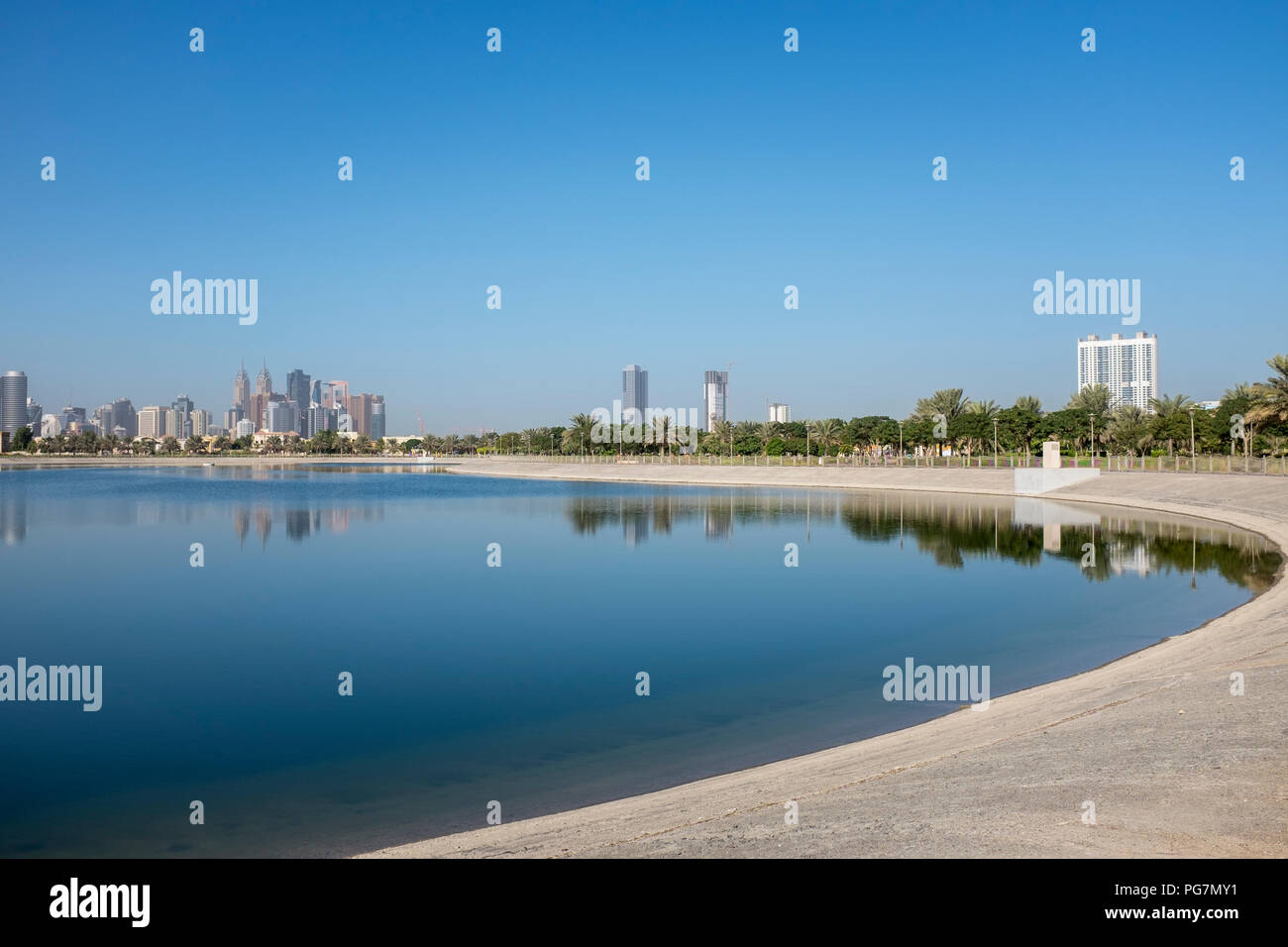 Man-made pond at Al Barsha Pond Park, Dubai, United Arab Emirates Stock ...