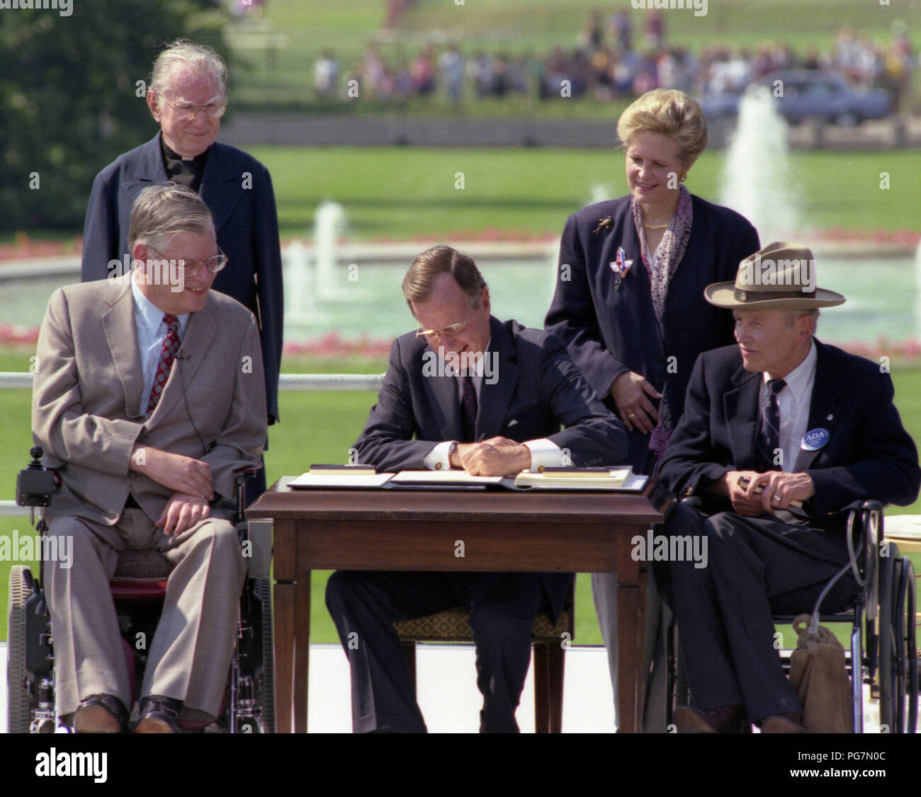 President Bush signs the Americans with Disabilities Act on the South ...