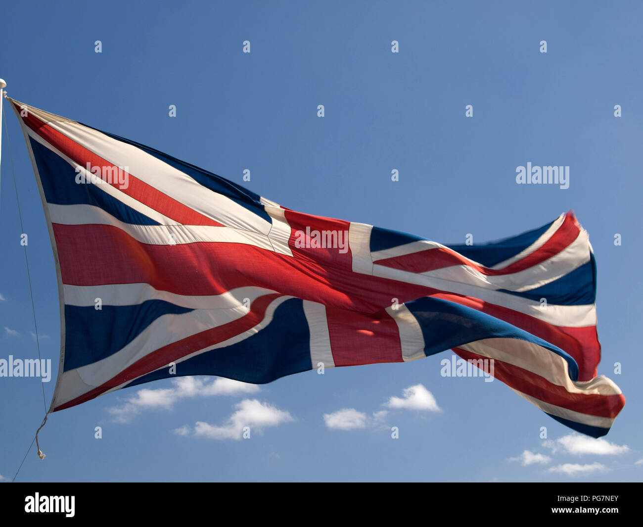 Union jack flag flapping in the wind hi-res stock photography and ...