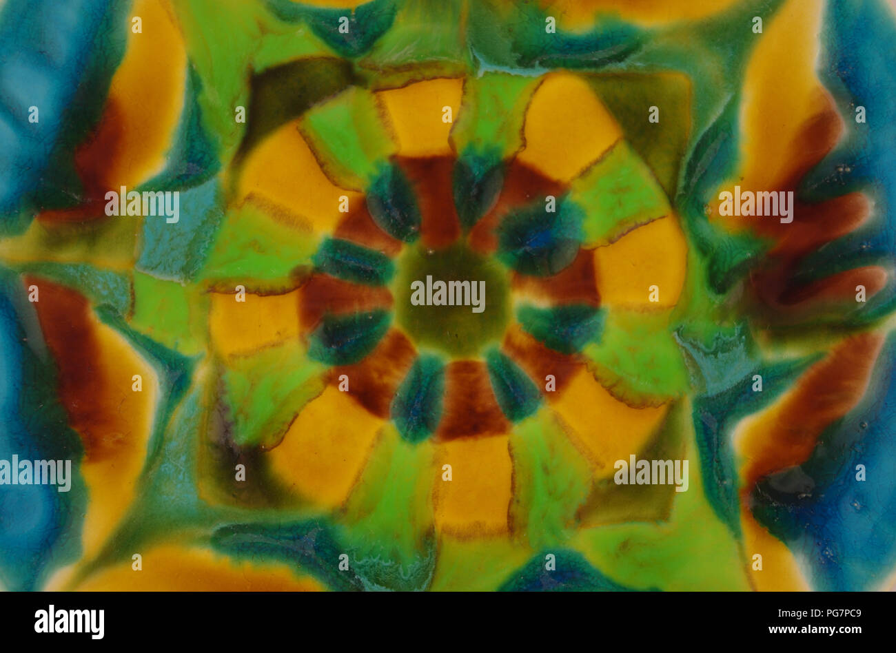 Painting of a rosette in green, blue and brown tones Stock Photo - Alamy