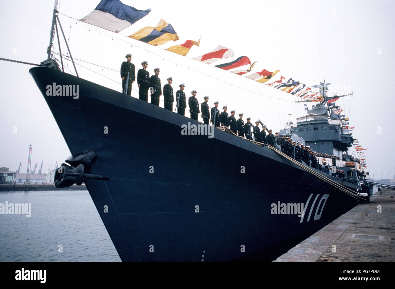 Chinese sailors man the rail of a Chinese destroyer during an ...