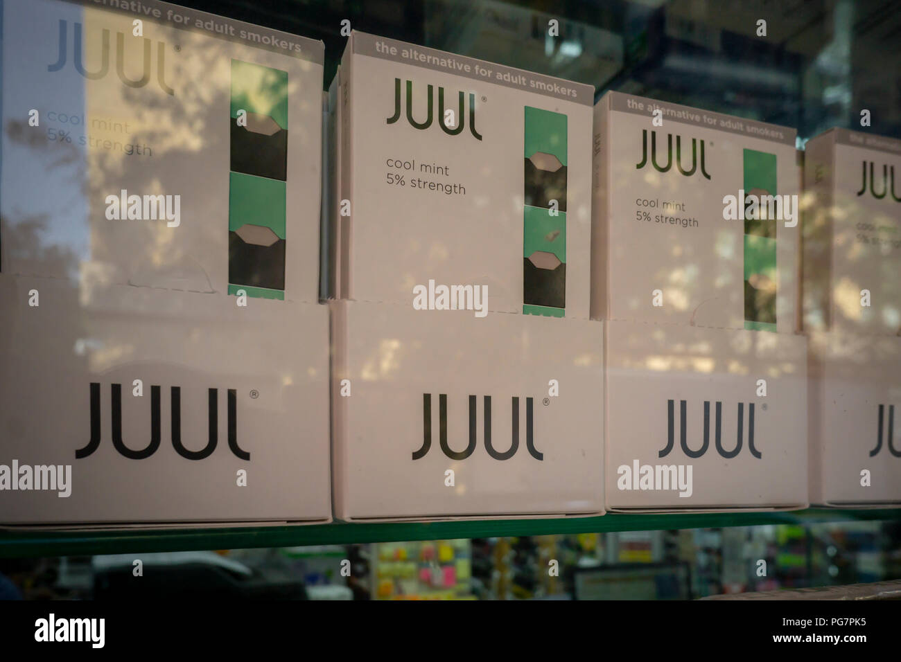 A selection of the popular Juul brand vaping supplies on display in the ...