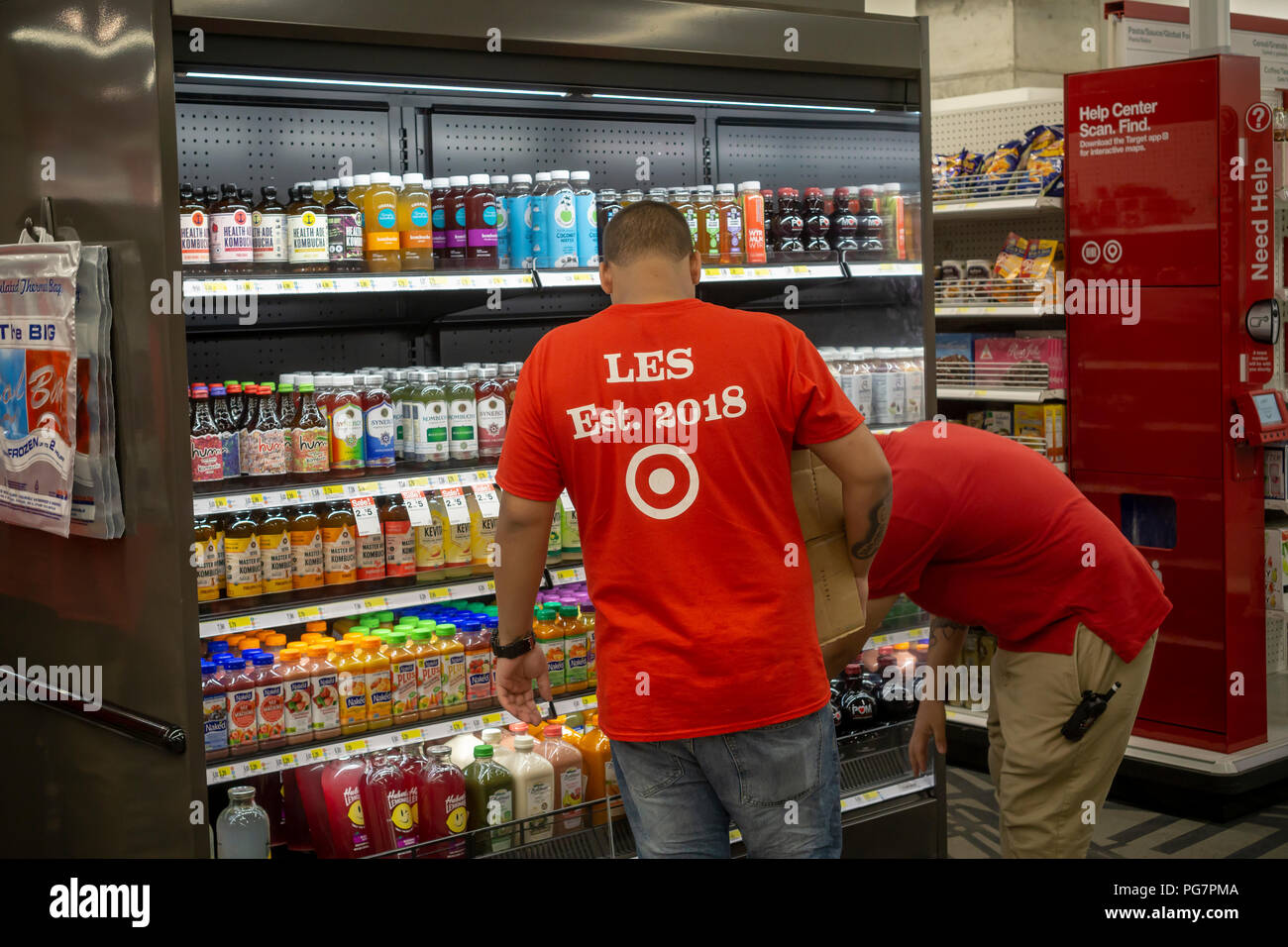 Workers in a Target store in the Lower East Side neighborhood of New ...