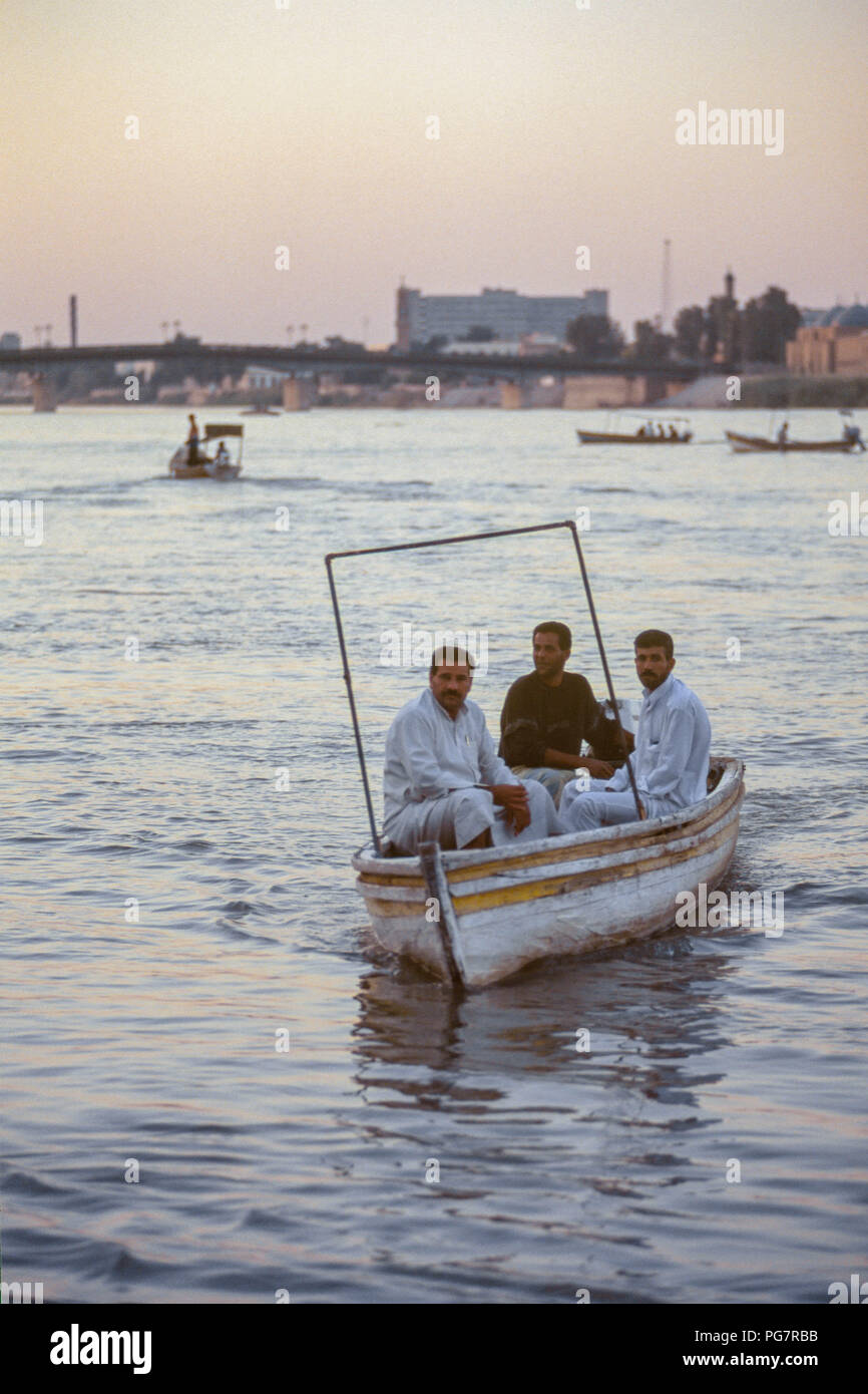Fishing on the Tigris River in central Baghdad near the Republic Bridge ...