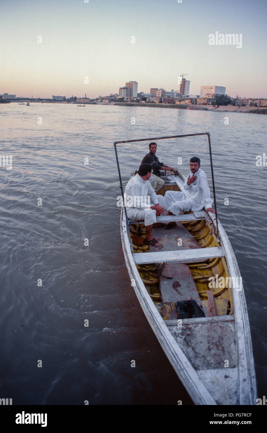 Fishing on the Tigris River in central Baghdad near the Republic Bridge ...