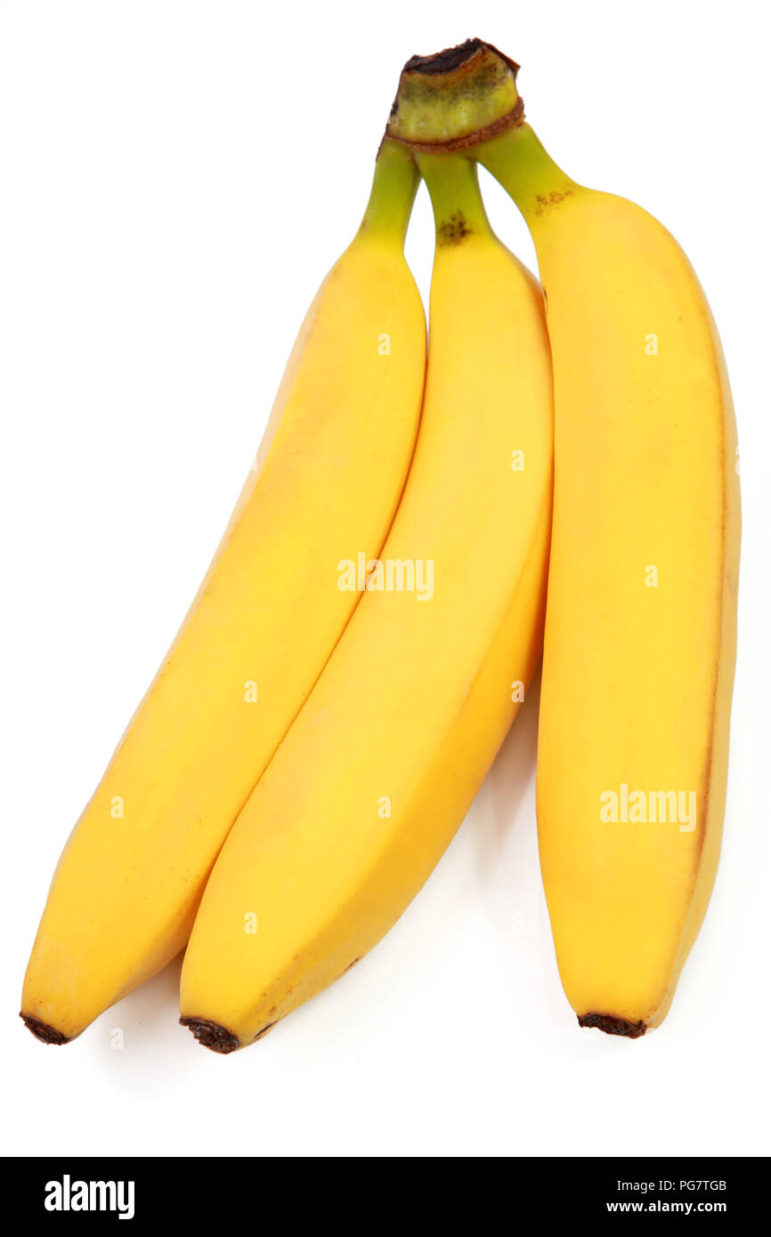 Three ripe bananas isolated on white background Stock Photo - Alamy