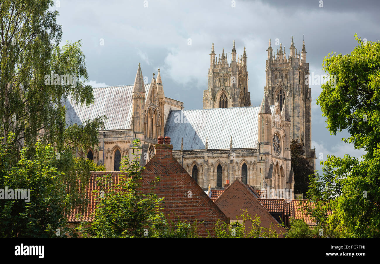 The ancient, 12th century, minster (church) on a bright, overcast ...