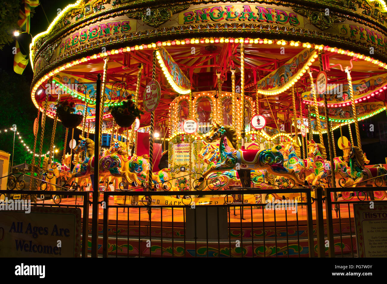 Kids carousel in the night Stock Photo - Alamy