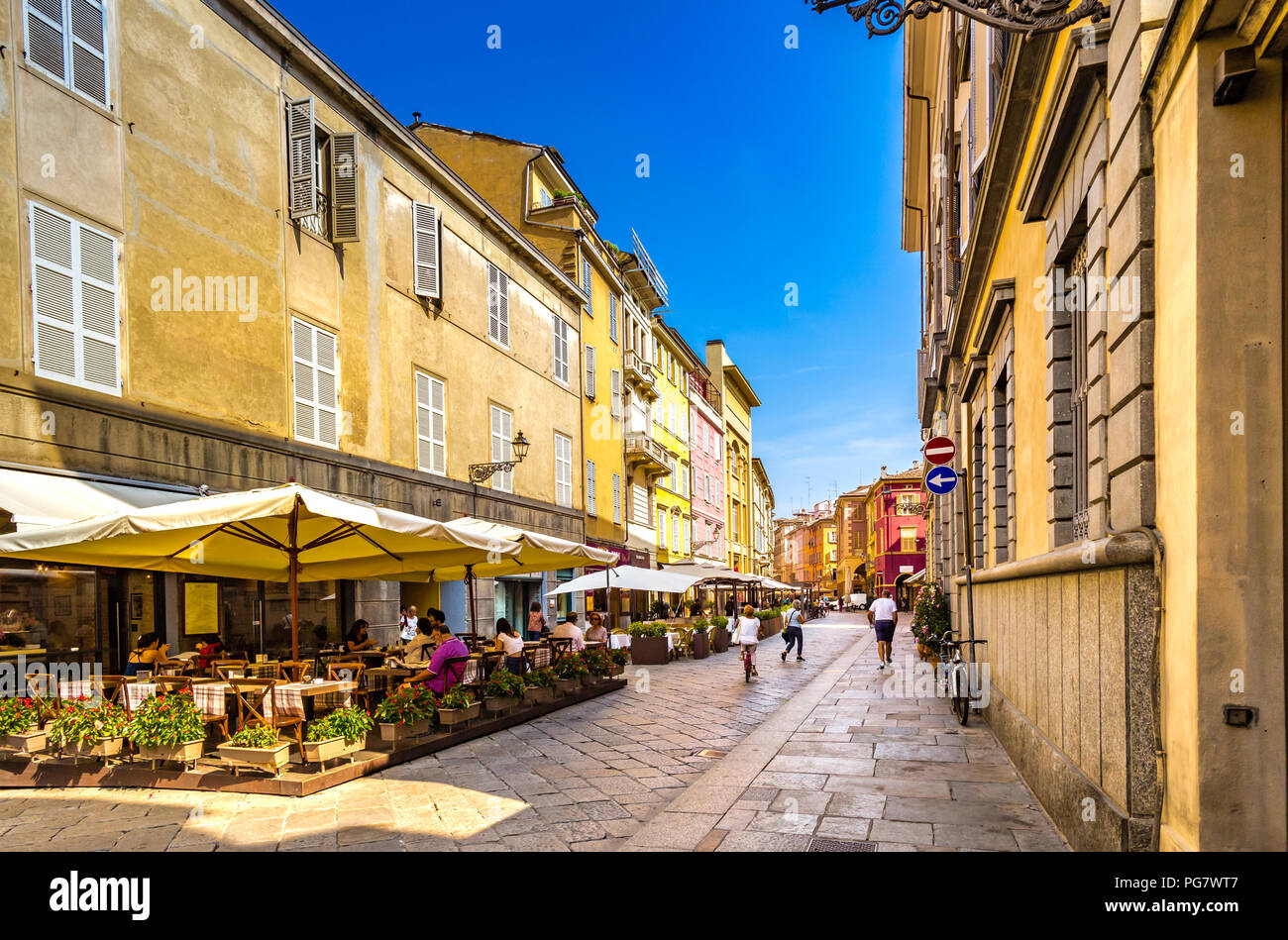 PARMA, ITALY – AUGUST 23, 2018: Tourists are walking and enjoying the ...