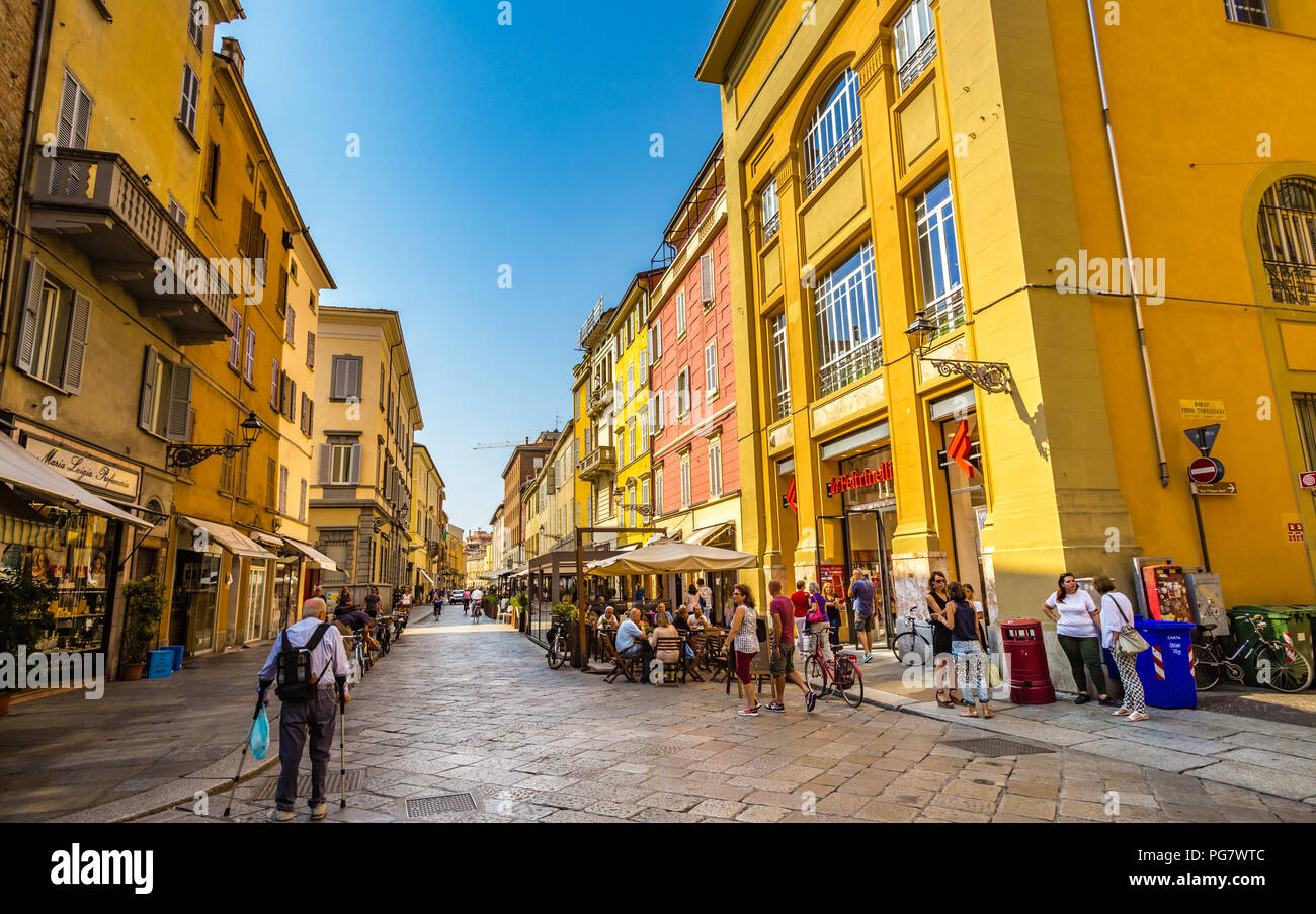 PARMA, ITALY – AUGUST 23, 2018: Tourists are walking and enjoying the ...